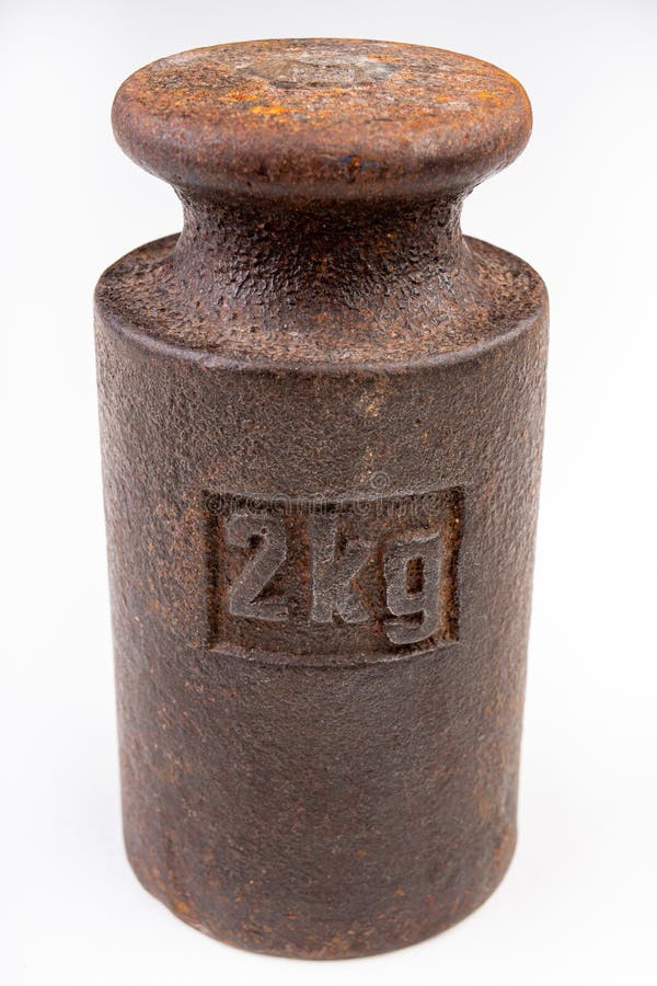 Old Weights for Weighing on a White Table. Steel Weights Worth 2 ...
