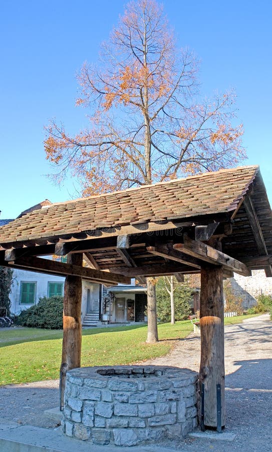 Old well 1 stock photo. Image of stone, tiled, city, autumn - 3712608