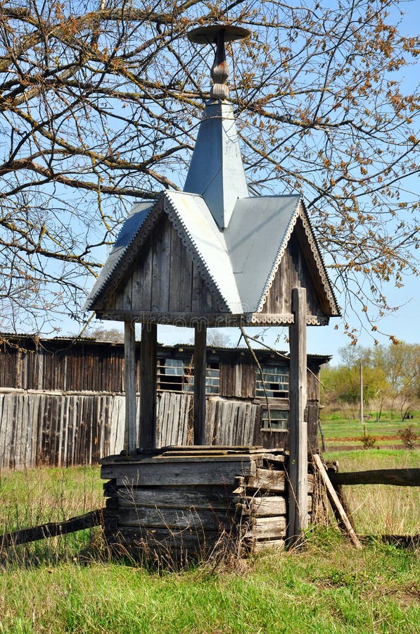 Old well with decorations stock image. Image of vintage - 64452525
