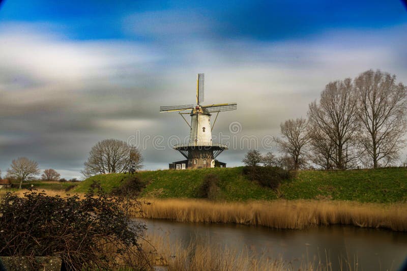 Windmill stock image. Image of standing, stream, windmill - 272016067