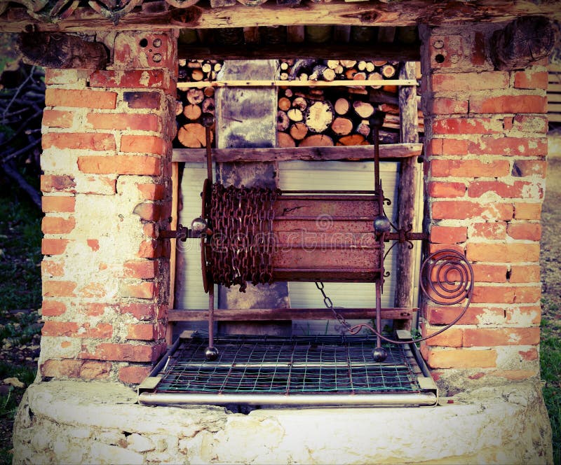 Old Well in Stonework with Rusty Chain To Collect Water with the Stock ...