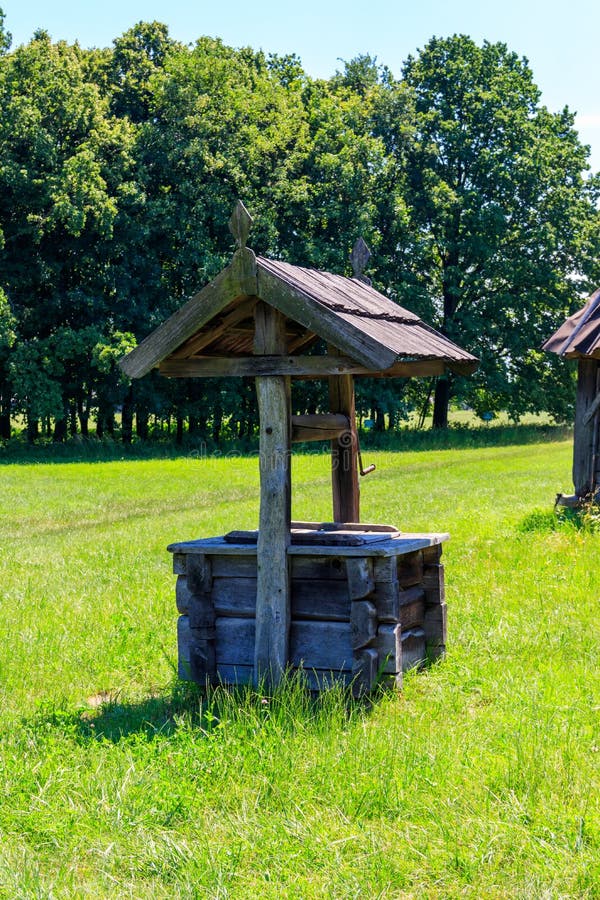 An Old Well in a Village Near a Summer Field Stock Image - Image of ...