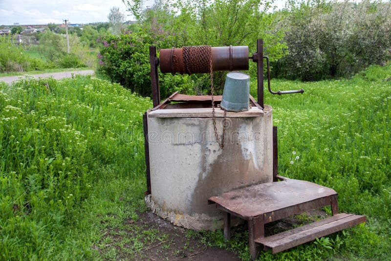 Old Well with Water in the Village Stock Photo - Image of outdoors ...