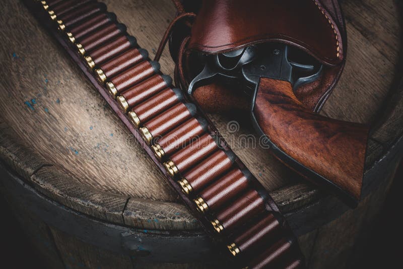 Old West Gun Belt with Ammunition and Revolver in Holster Stock Image ...