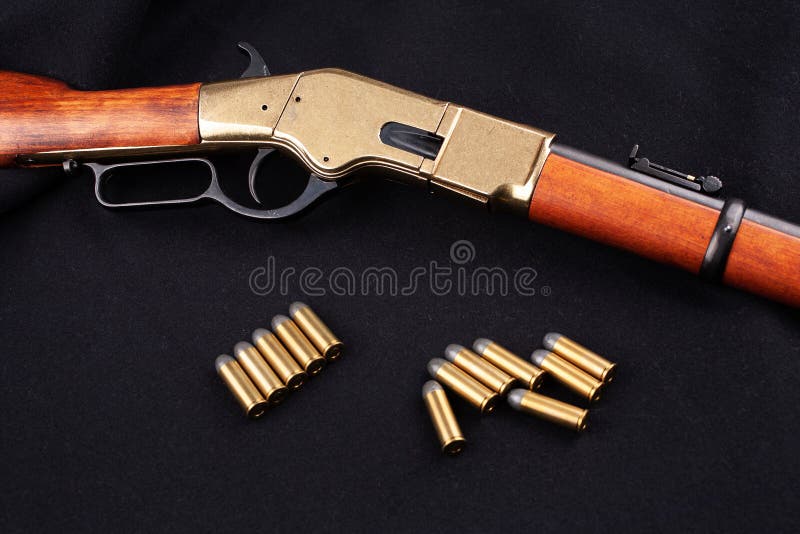 Old West Rifle with Ammunition Stock Photo - Image of county, action ...