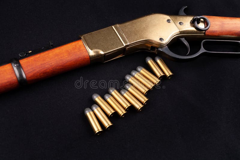 Old West Rifle with Revolver and Ammunition Stock Image - Image of ...