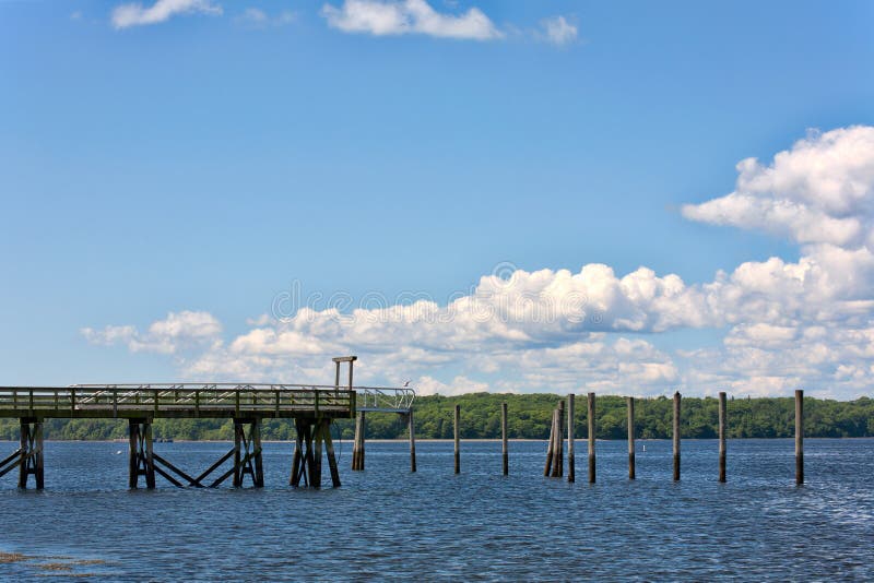 Old wharf with pilings stock photo. Image of seascape - 26143220