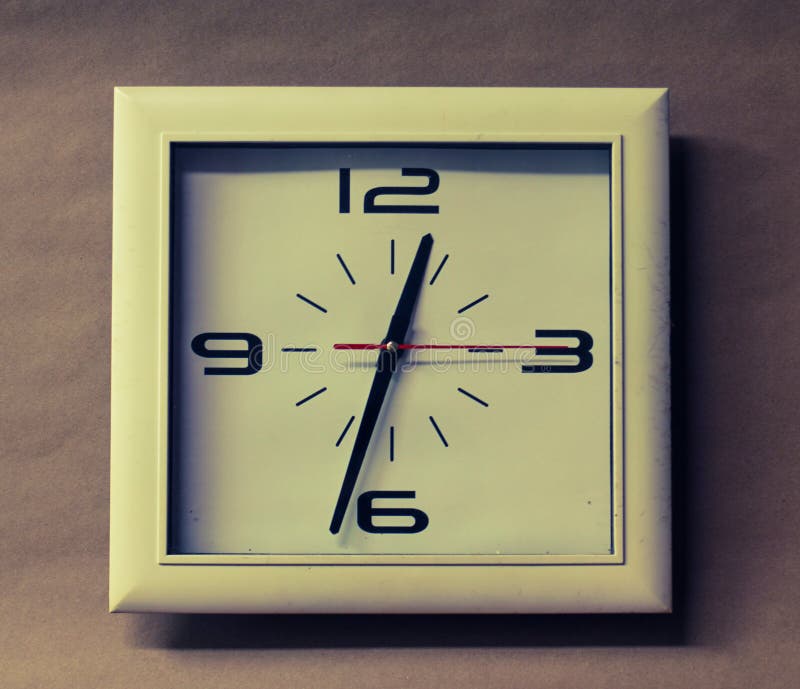 An Old White Analog Clock with a Square Wall Stock Photo - Image of ...