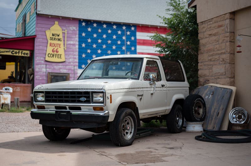 Old White Ford Bronco Third Generation Parked with the USA Flag on the ...