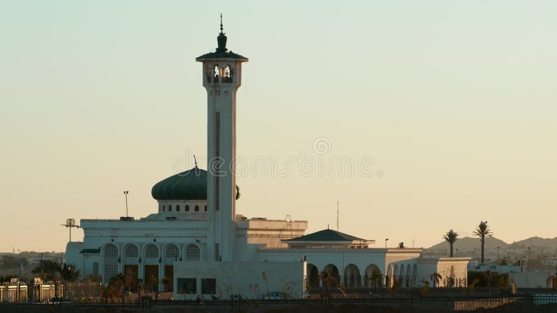 Old White Mosque with Green Domes during Sunset. Palm Trees and ...