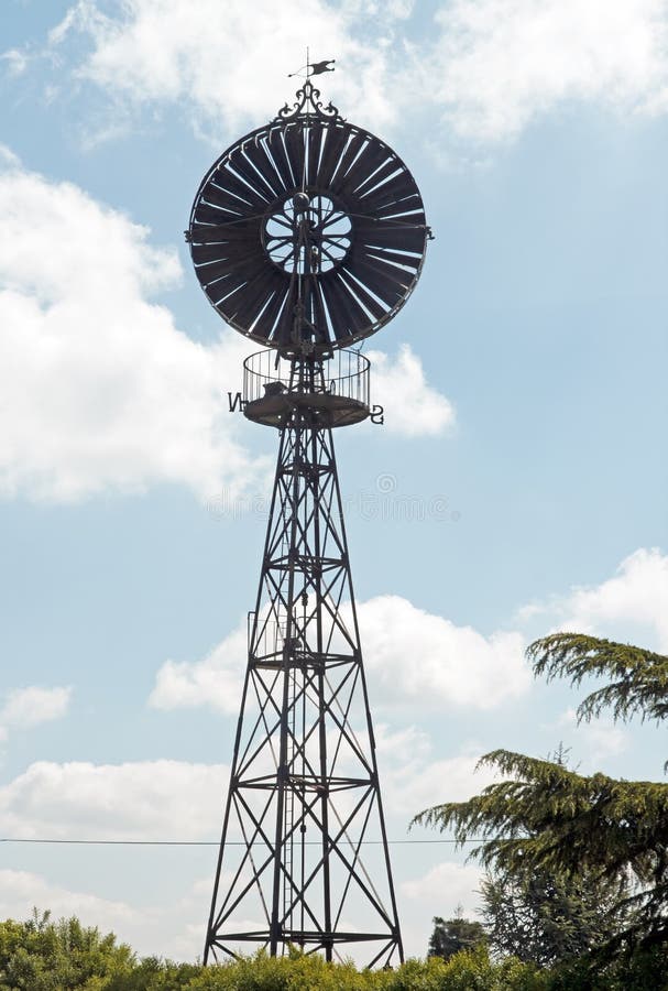 Old Wind between Clouds and Trees, Retro Wind on Blue Sky Stock Image ...