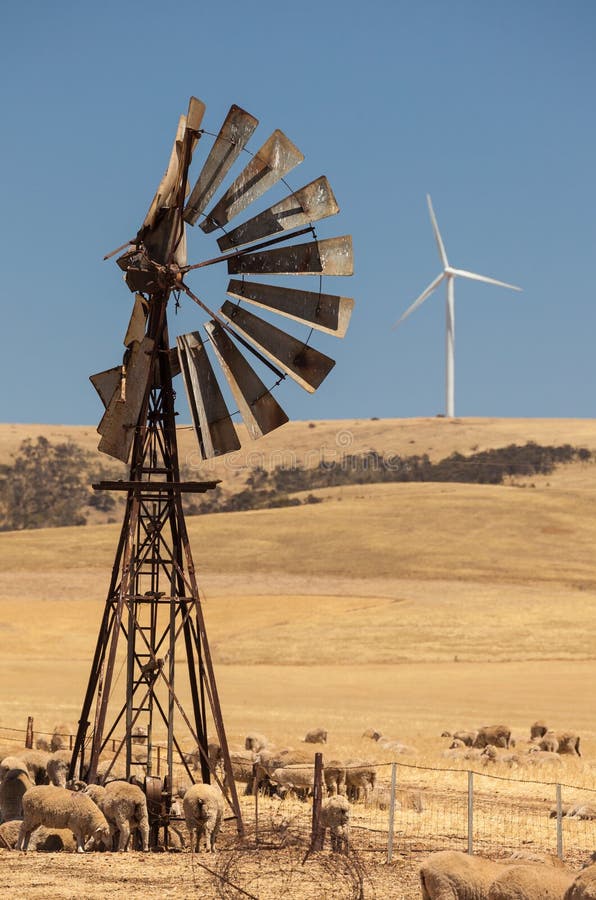 Old Wind Pump and New Wind Generators Distorted by Hot Air. South ...