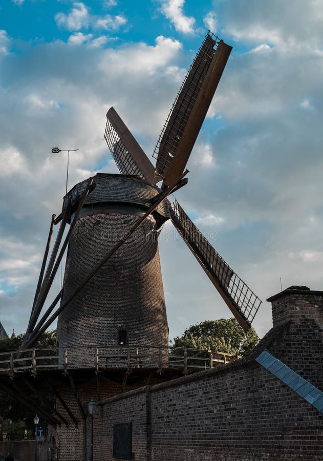Old windmill in the barn stock image. Image of stone - 254232957