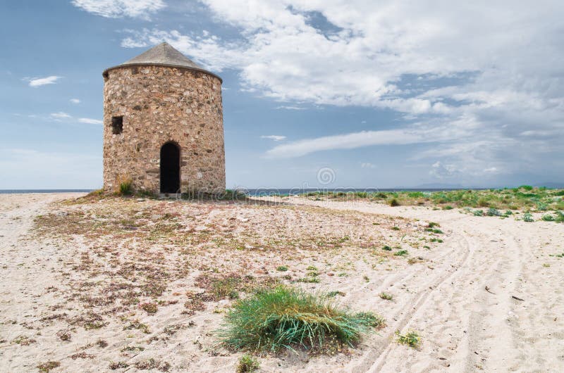 Old windmill on the beach stock photo. Image of calm - 81030998