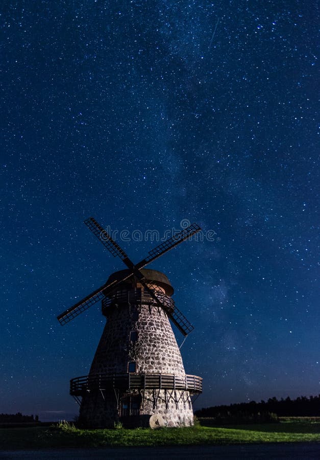 An Old Windmill in the Night with Clouds Stock Photo - Image of night ...