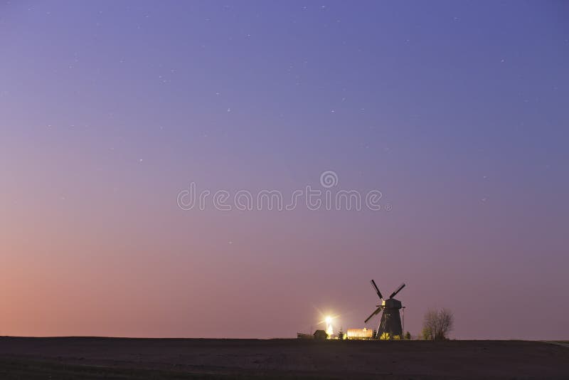 Old Windmill in a Starry Spring Night Stock Photo - Image of house ...