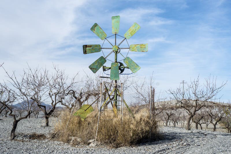 Old Windmill To Draw Water from a Well Stock Image - Image of grass ...