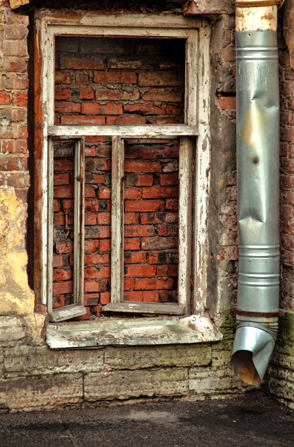 Old Window with Bricks and Metal Scribed Drain Pipe on an Old Pe Stock ...
