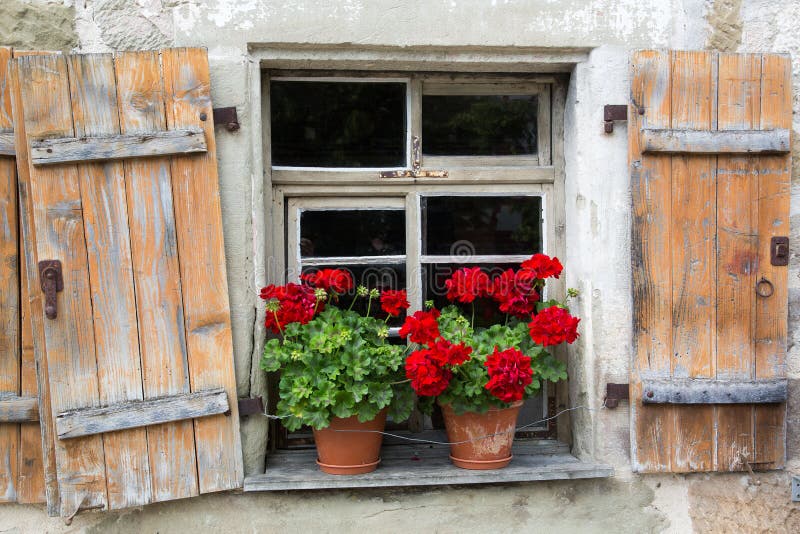 Old Window with Open Shutters and Geranium Flower Decoration Stock ...