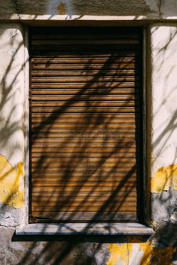 Old Window with Wooden Shutters and Tree Branches Shadow Stock Photo ...