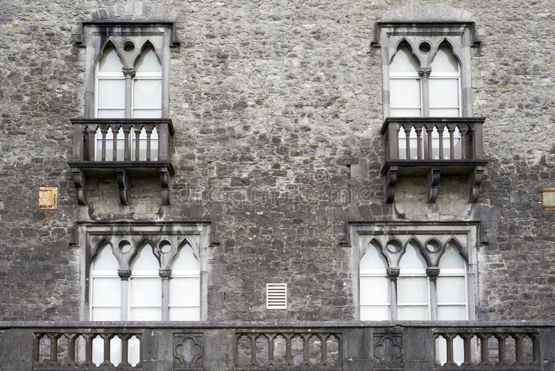 Old windows with balcony stock photo. Image of kilkenny - 52510168
