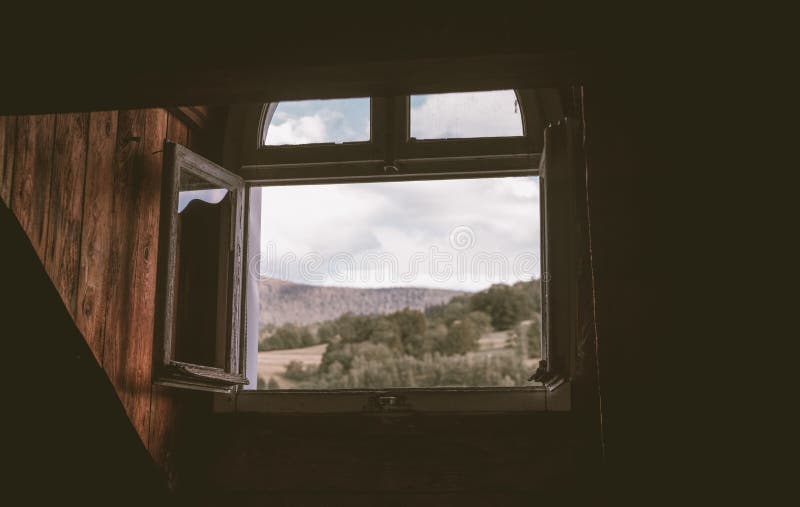 Old Windows Open in the Wood Attic with a View of the Forest in the ...