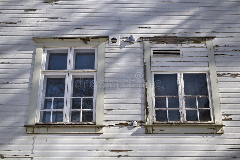 Old Windows in Weathered Wooden Wall Exterior Stock Image - Image of ...