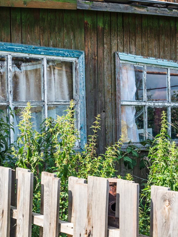 Old Windows at a Wooden House with a Fence Stock Photo - Image of glass ...