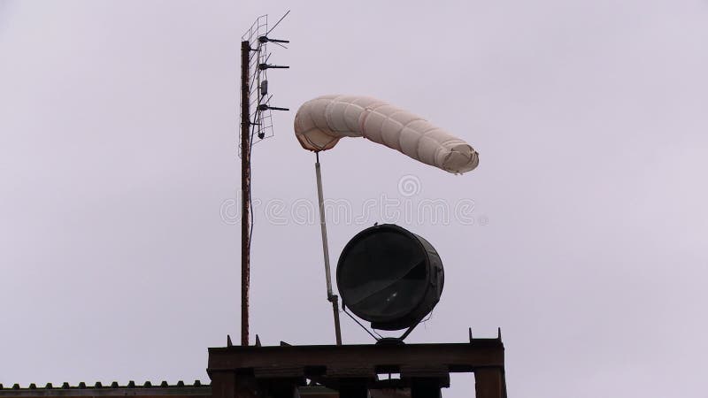 Old windsock and antennas stock footage. Video of windsock - 77072340