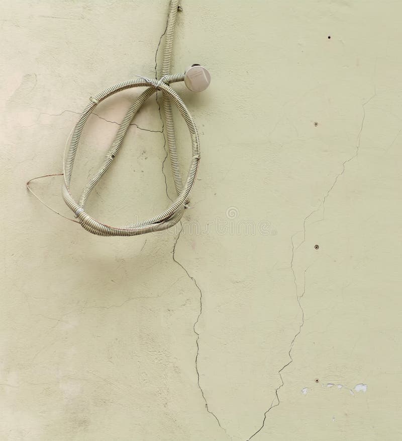 Old Wire Hanging on the Wall Twisted Stock Image - Image of design ...