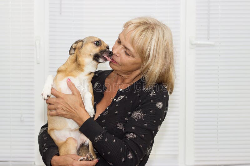 Old woman and dog stock photo. Image of woman, house - 76319624