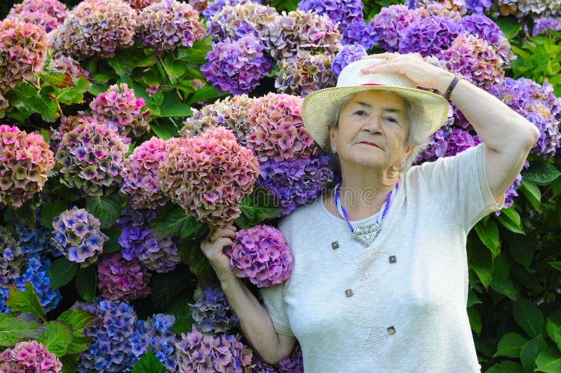 Happy with flowers stock photo. Image of elderly, adult - 570366