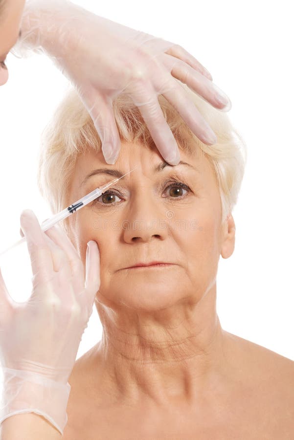 An Old Woman Having a Injection- Beauty Concept. Stock Photo - Image of ...
