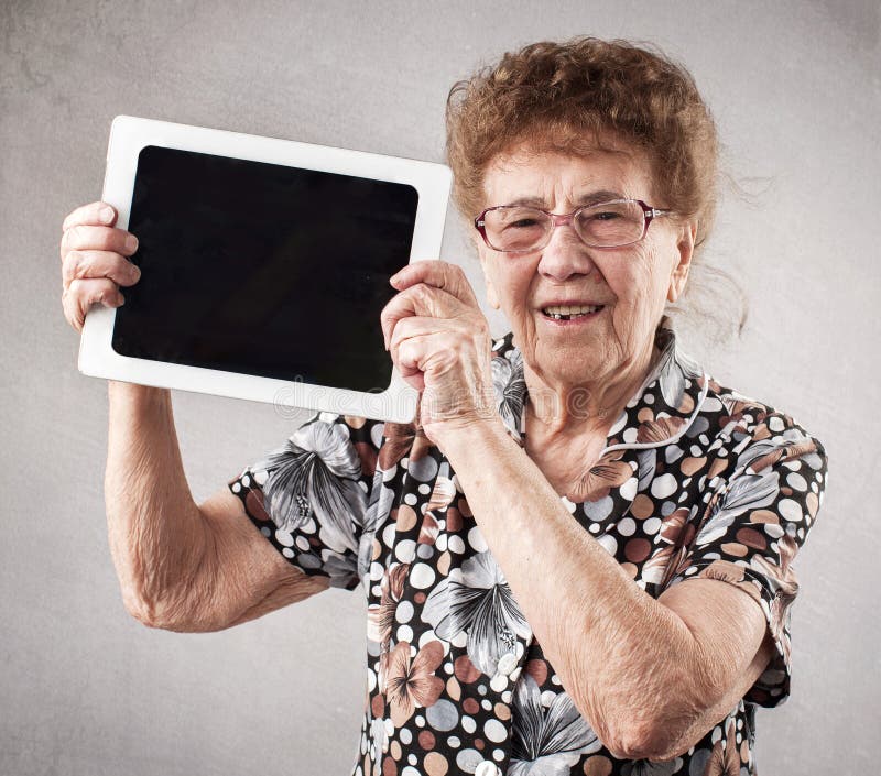 Old Woman Holding a Tablet in the Hands of Stock Photo - Image of hand ...