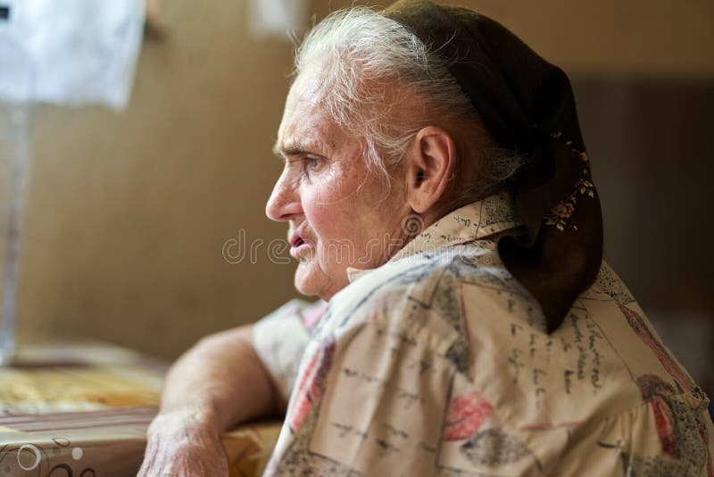 Old woman indoor stock photo. Image of expression, people - 154724710