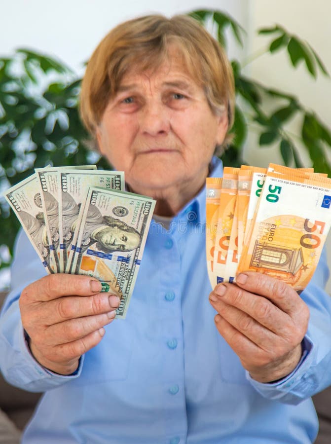 Old Woman with Money. Selective Focus Stock Photo - Image of senior ...