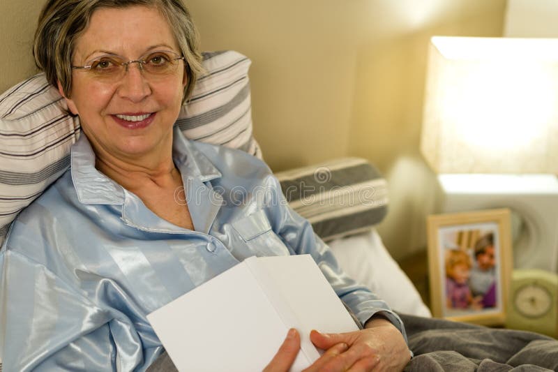 Old Woman In Pajamas Lying In Bed Stock Image Image Of Lying