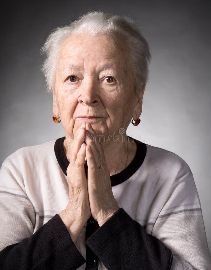 Old woman praying stock photo. Image of looking, senior - 31361372