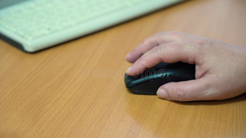 An Old Woman S Hand Controls a Computer Mouse. Senior Woman S Hand ...