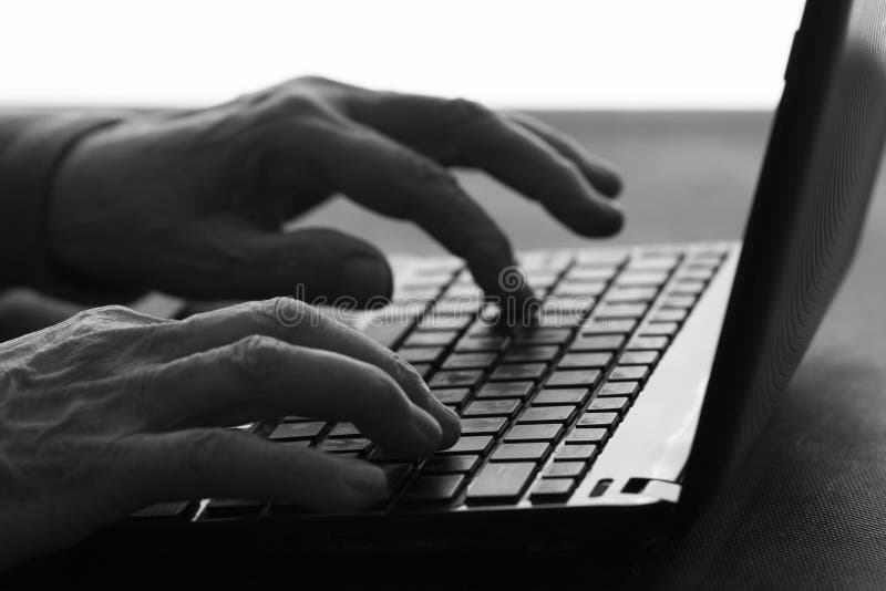 Old Woman Typing on a Laptop Stock Photo - Image of distant, adult ...