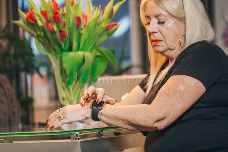 Old Woman Use Smartwatch at Home Stock Image - Image of aged ...