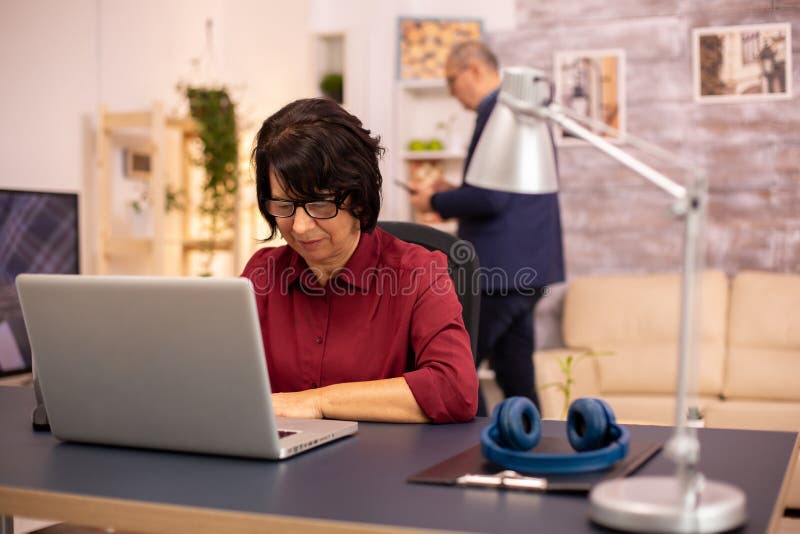 Old Woman Using a Modern Computer in Her Living Room Stock Image ...