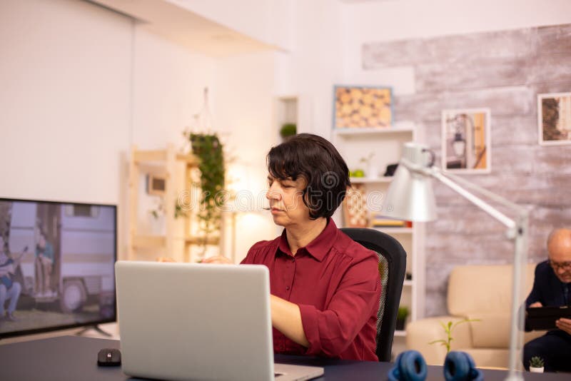 Old Woman Using a Modern Computer in Her Living Room Stock Image ...