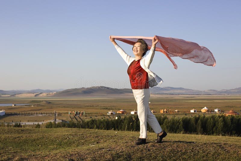An Old Woman in Wind Morning Stock Photo - Image of extensive, forwards ...