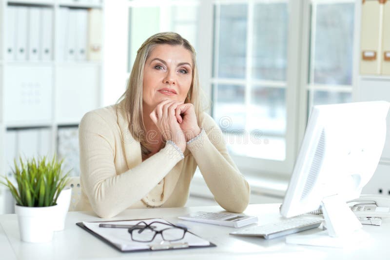 Senior Woman Working in Office with Computer Stock Photo - Image of ...