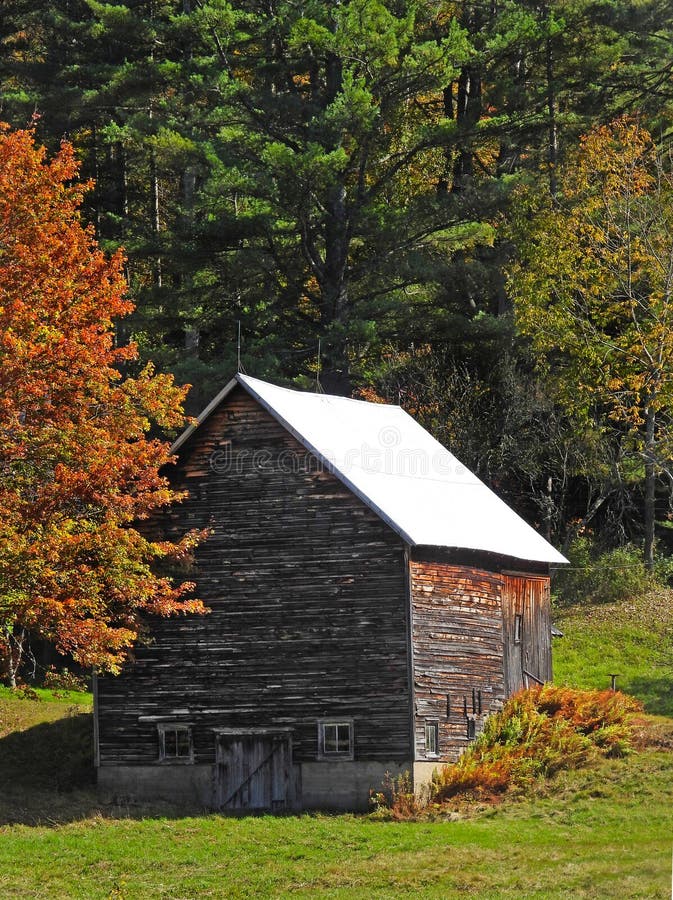 Old Weathered Wood Storage Barn Under Colorful Autumn Trees in the ...