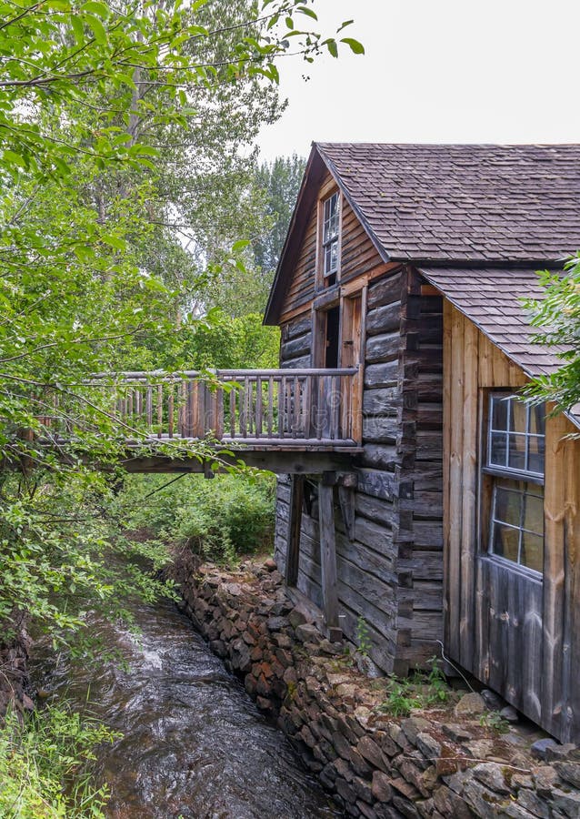 Old Wood Building on Small River Bank Stock Photo - Image of rusty ...