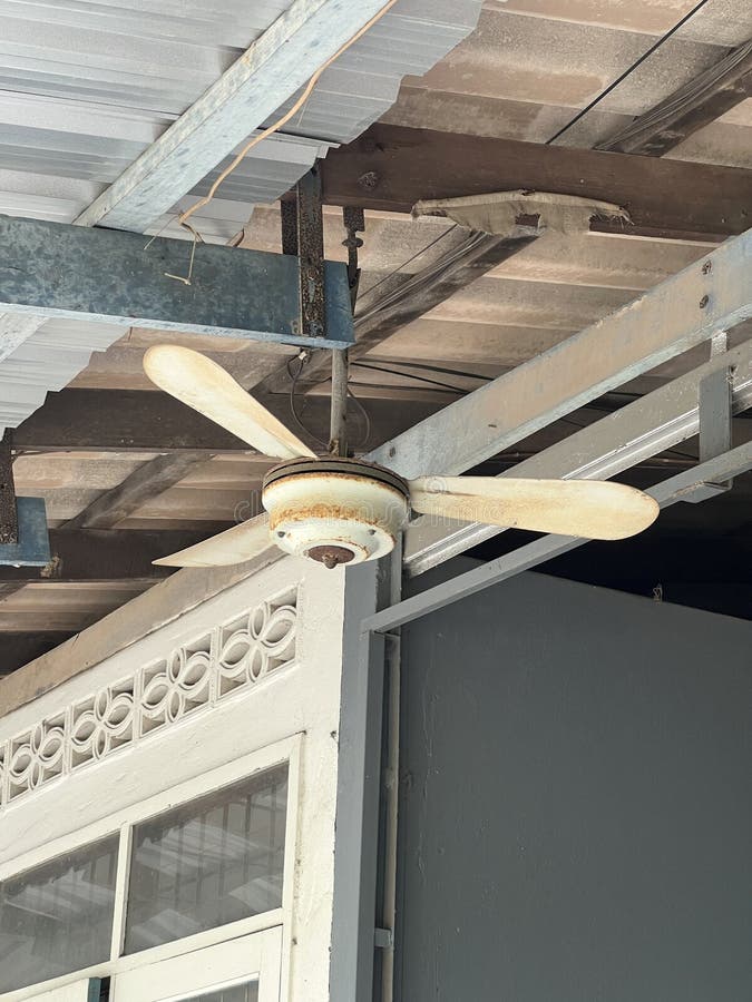 Old wood house with a fan stock photo. Image of vintage - 328669846