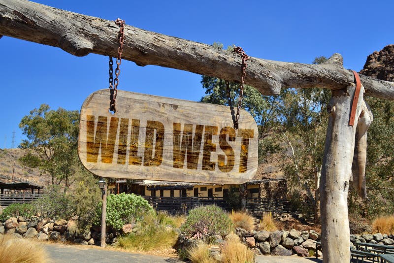 Old Wood Signboard with Text ` Wild West ` Stock Photo - Image of ...