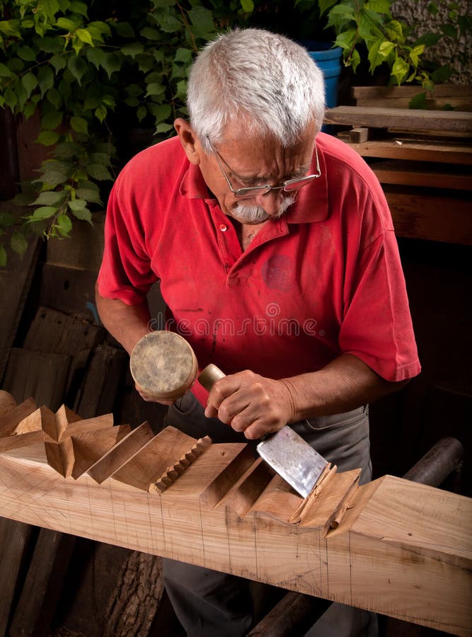 Woodcarver Working with Mallet and Chisel Stock Photo - Image of brown ...